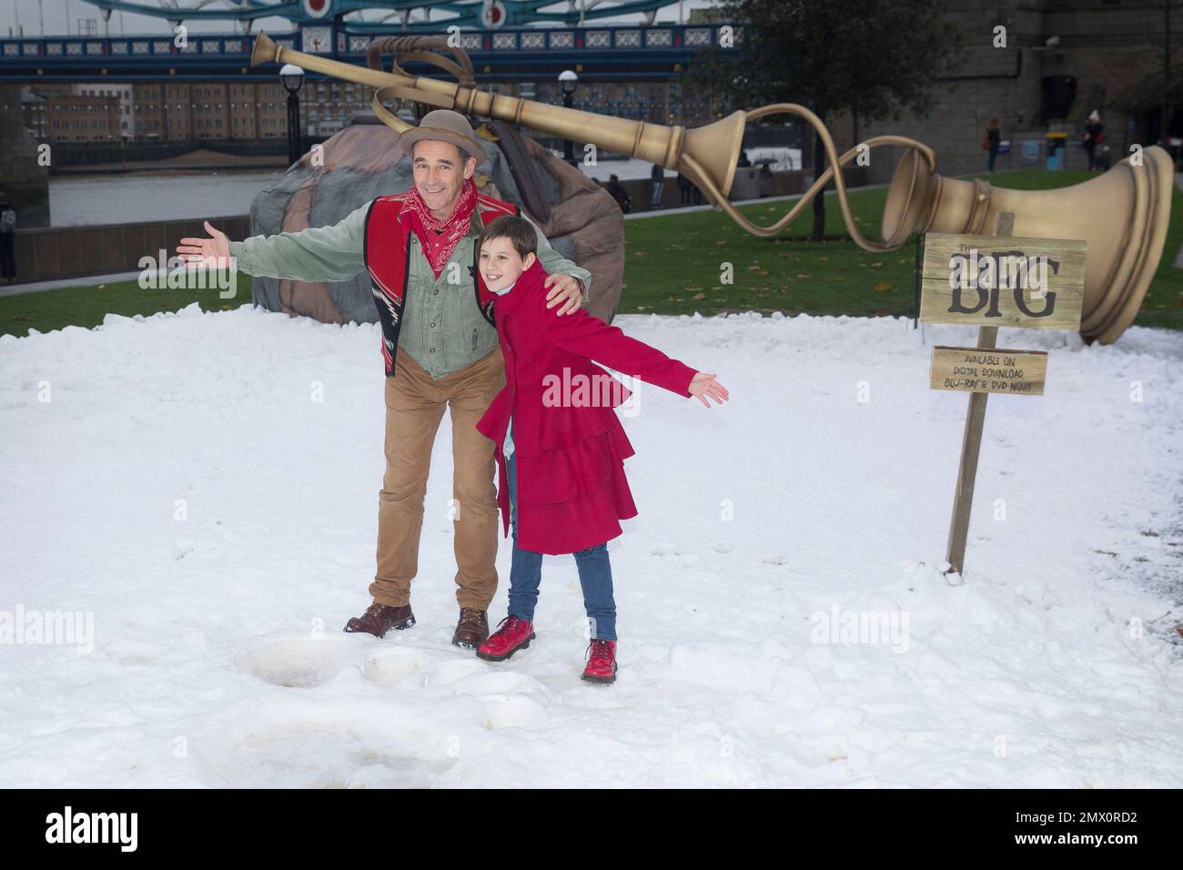 Actors Mark Rylance, left and Ruby Barnhill stand next to giant ...