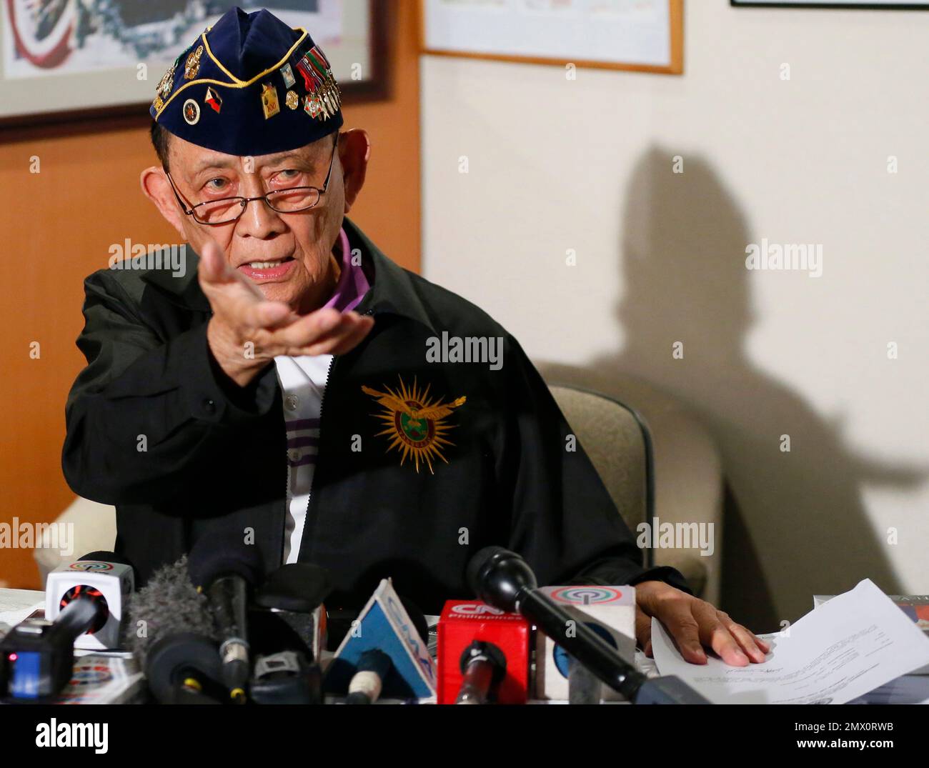 Former Philippine President Fidel Ramos speaks at a news conference ...