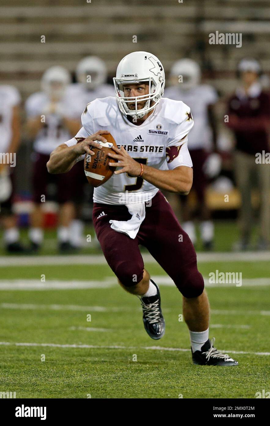 Texas State quarterback Eddie Printz runs for yardage during the second ...