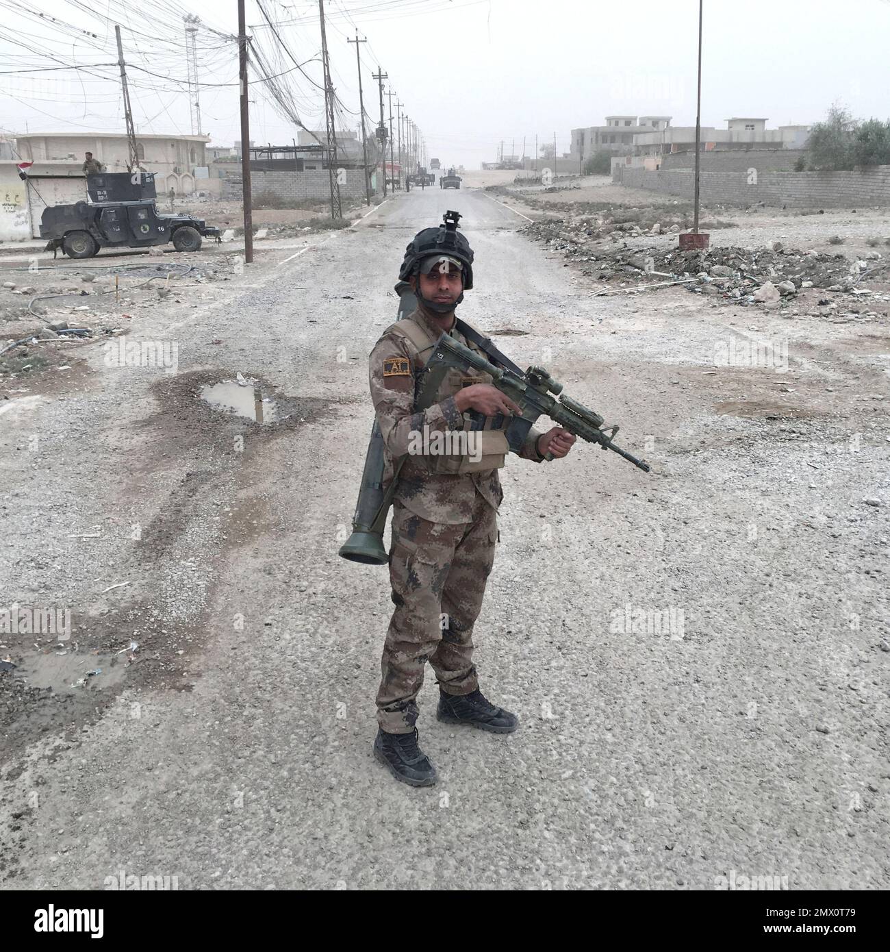 In this photo taken Tuesday, Nov. 1, 2016, Bergam Kadhim, from Najaf ...