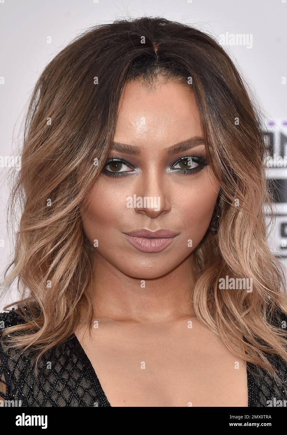 Kat Graham arrives at the American Music Awards at the Microsoft ...