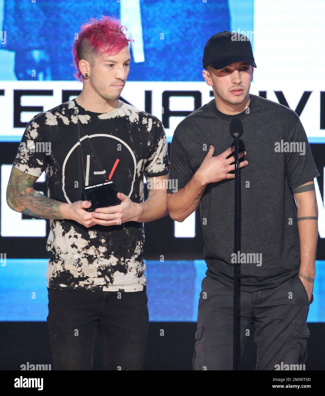Josh Dun, left, and Tyler Joseph, of Twenty One Pilots, accepts the ...