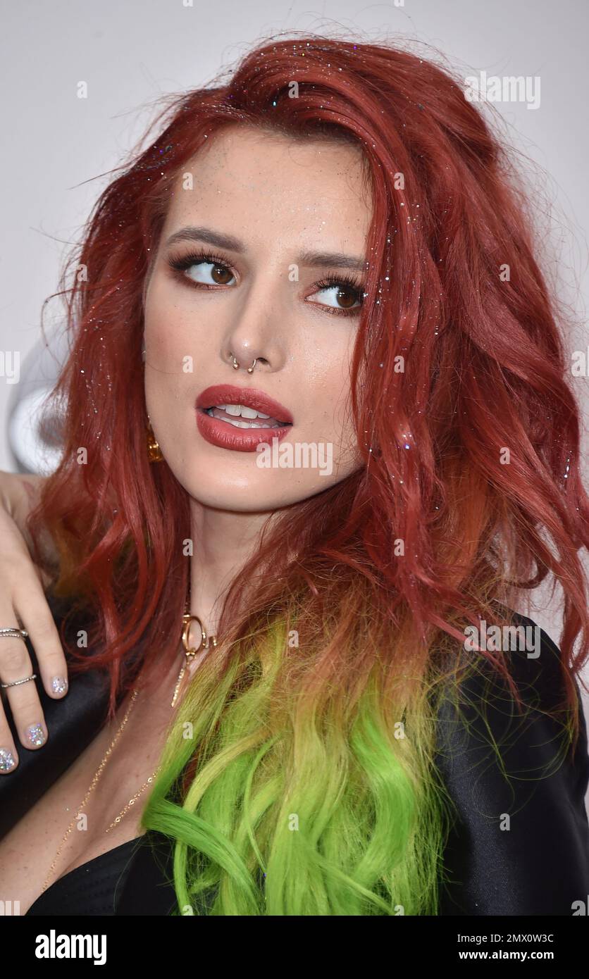 Bella Thorne arrives at the American Music Awards at the Microsoft ...