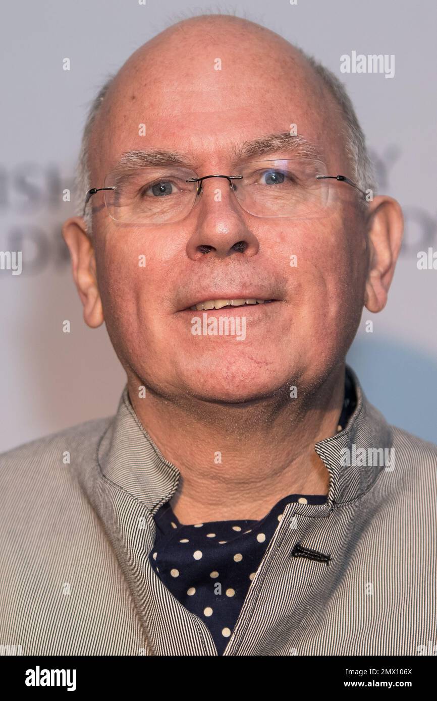 Peter Western poses for photographers upon arrival at the BAFTA ...