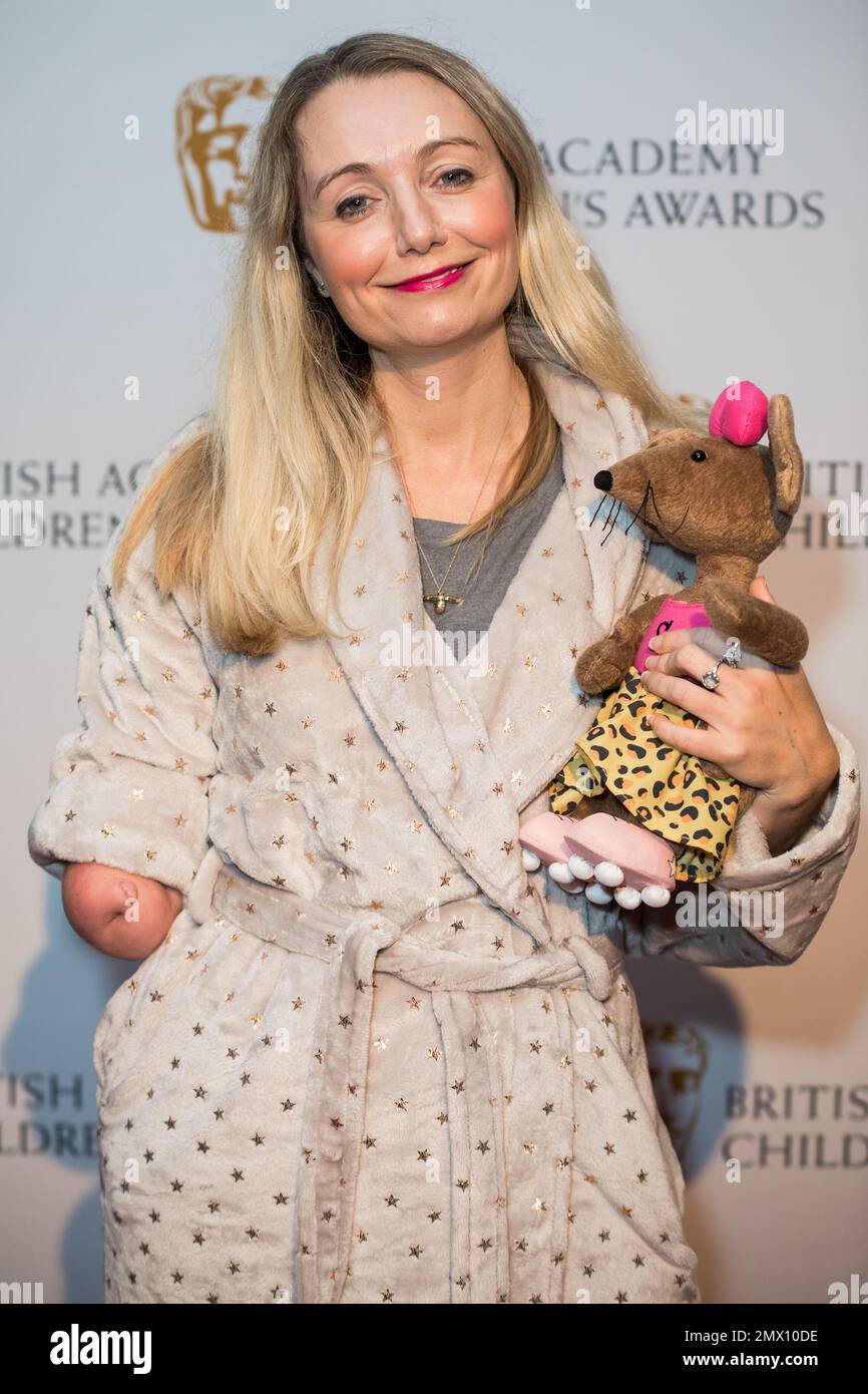 Cerrie Burnell poses for photographers upon arrival at the BAFTA ...