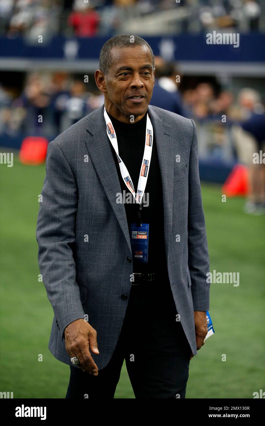 Hall of Famer Tony Dorsett walks along the sideline during the first ...