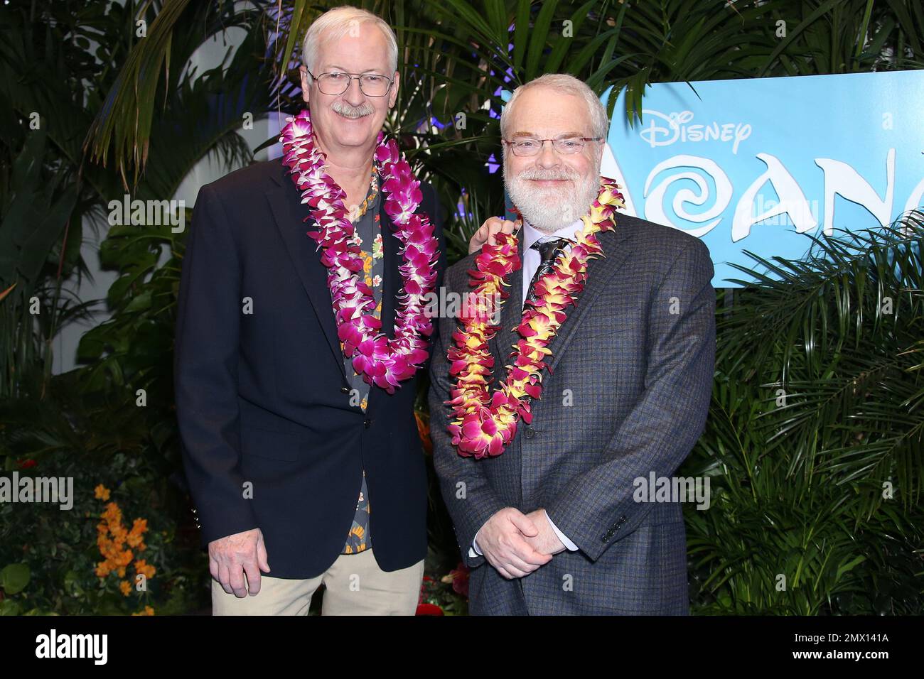 Director John Musker, left and Ron Clements pose for photographers upon ...