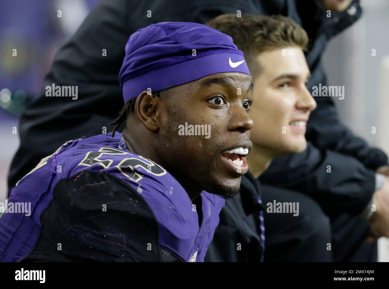 Washington running back Lavon Coleman sites on the sideline during an ...