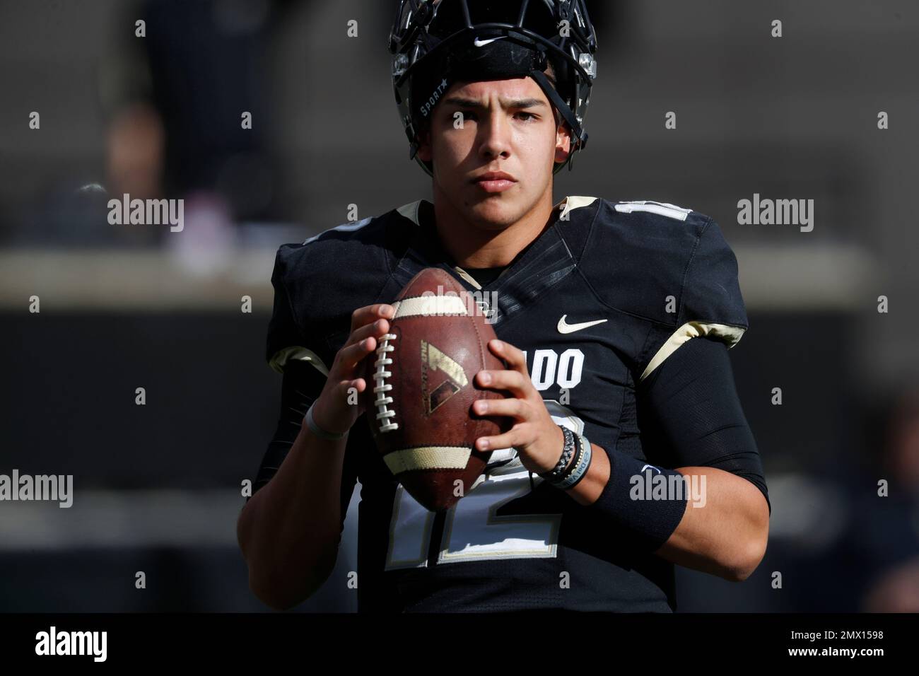 Colorado Buffaloes quarterback Steven Montez (12) warms up before the ...