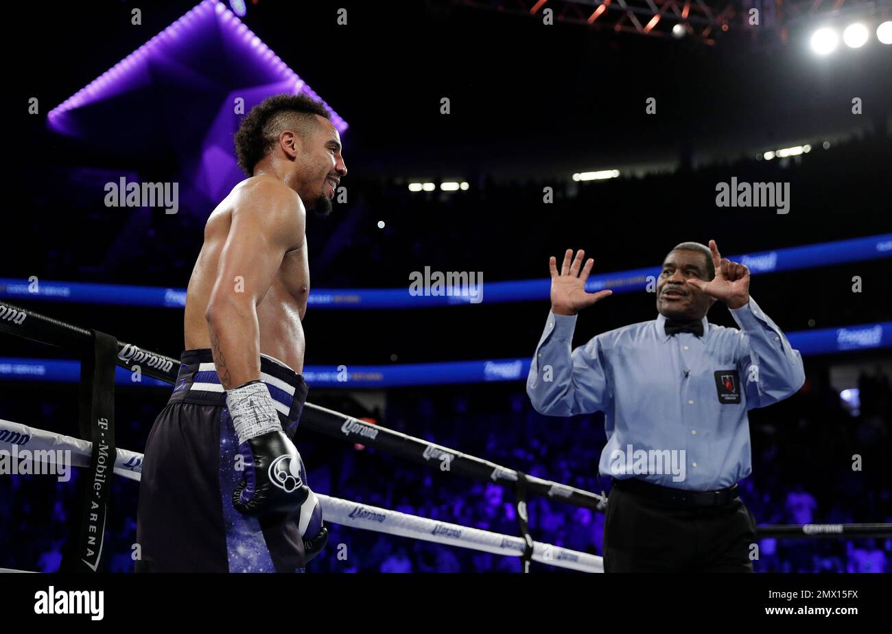 Andre Ward gets a standing count from the referee after a knockdown ...