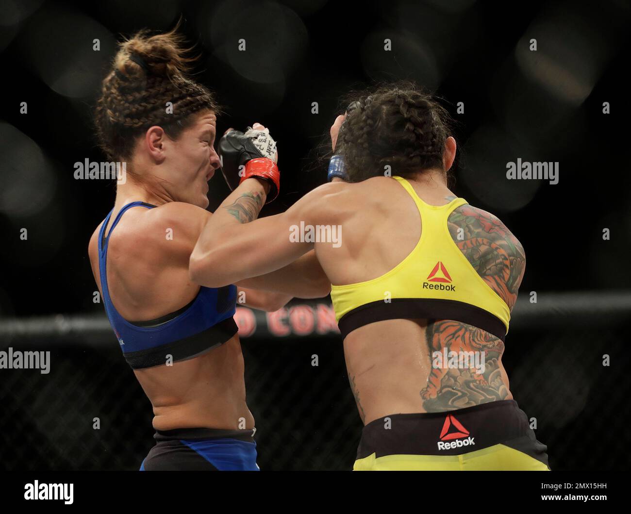 Cortney Casey, left, of the United States, fights Claudia Gadelha, of ...