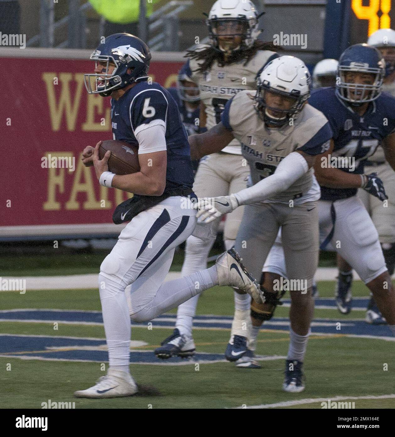 Nevada quarterback Ty Gangi reacts as he scores the game tying ...