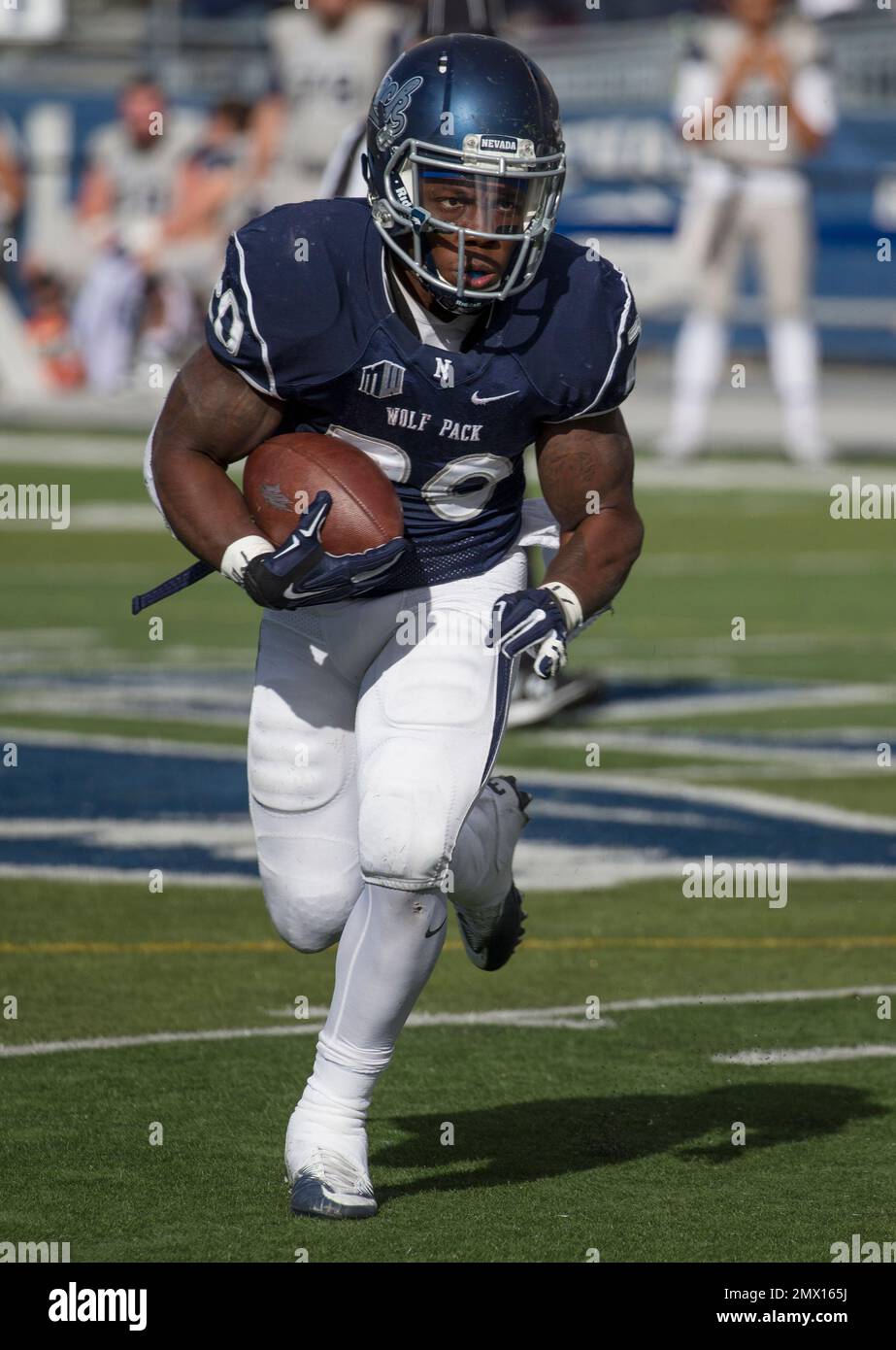 Nevada running back James Butler runs against Utah State in the first ...
