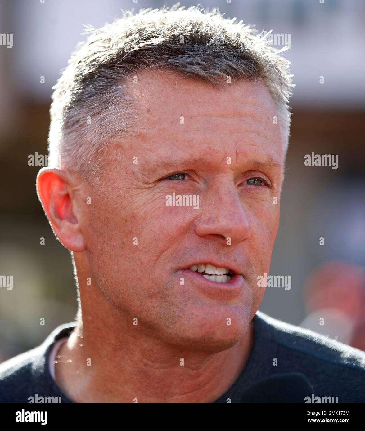 Utah head coach Kyle Whittingham, watches his players warm up before a ...