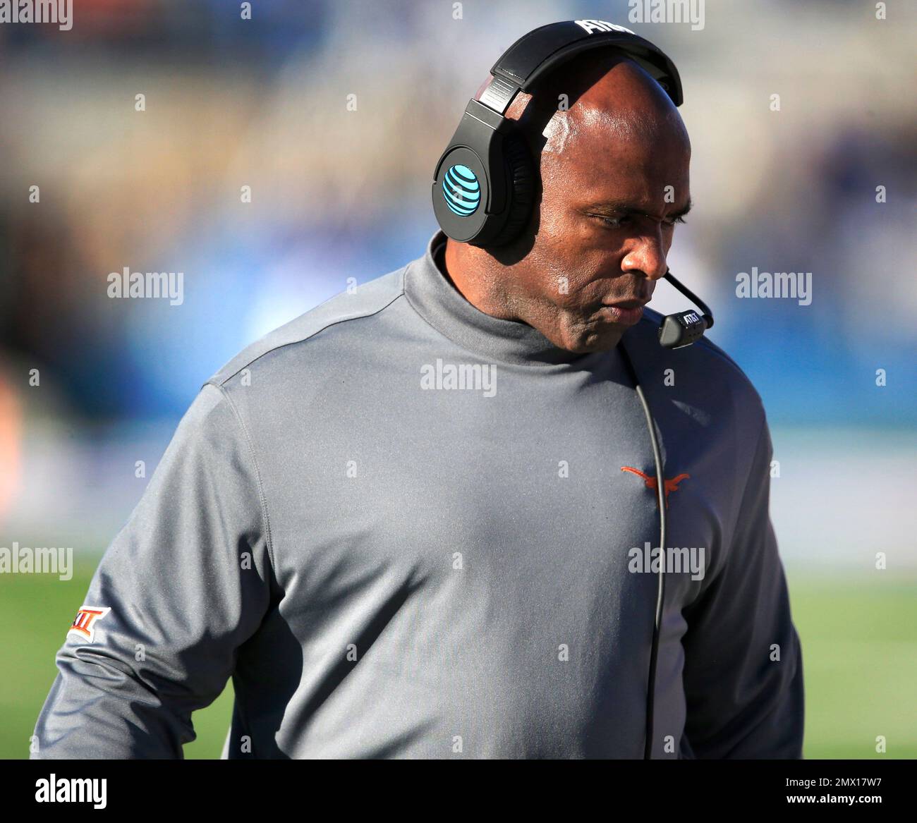 Texas head coach Charlie Strong walks the sideline during the first ...