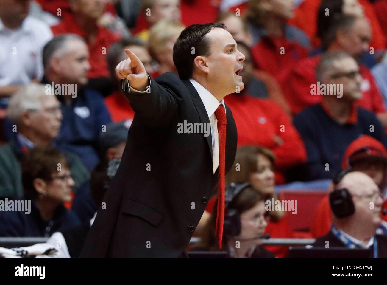 Dayton's head coach Archie Miller works the bench in the first half an ...