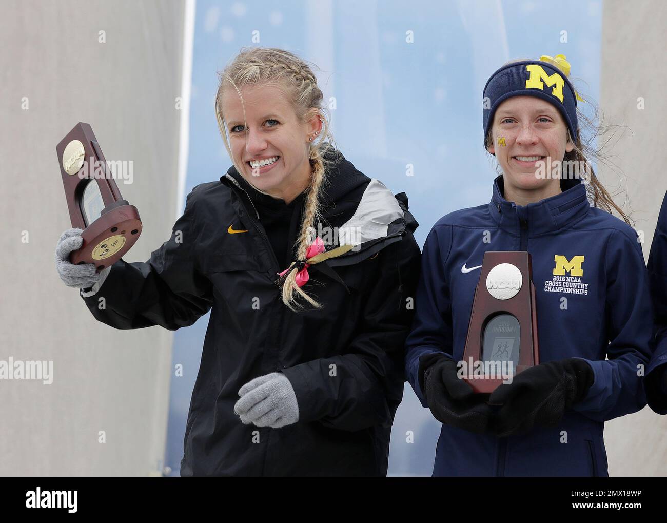 Missouri's Karissa Schweizer, left, and Michigan's Erin Finn hold their ...