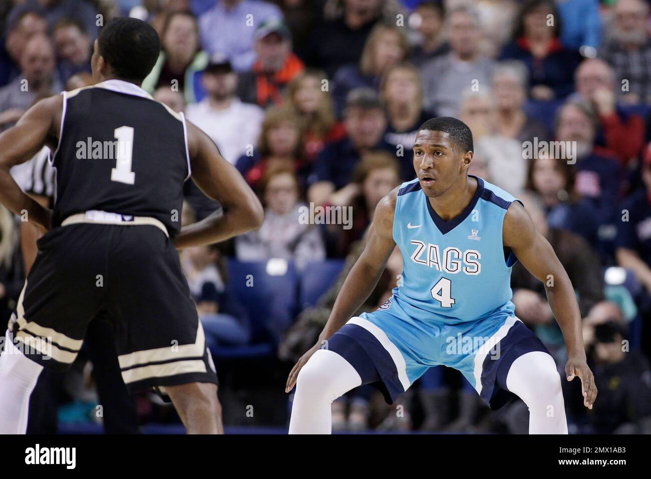 Gonzaga guard Jordan Mathews (4) defends Bryant guard Hunter Ware (1 ...