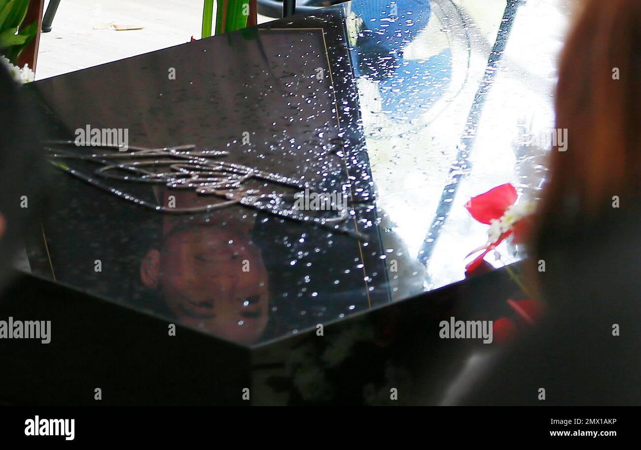 The portrait of the late Philippine dictator Ferdinand Marcos is ...