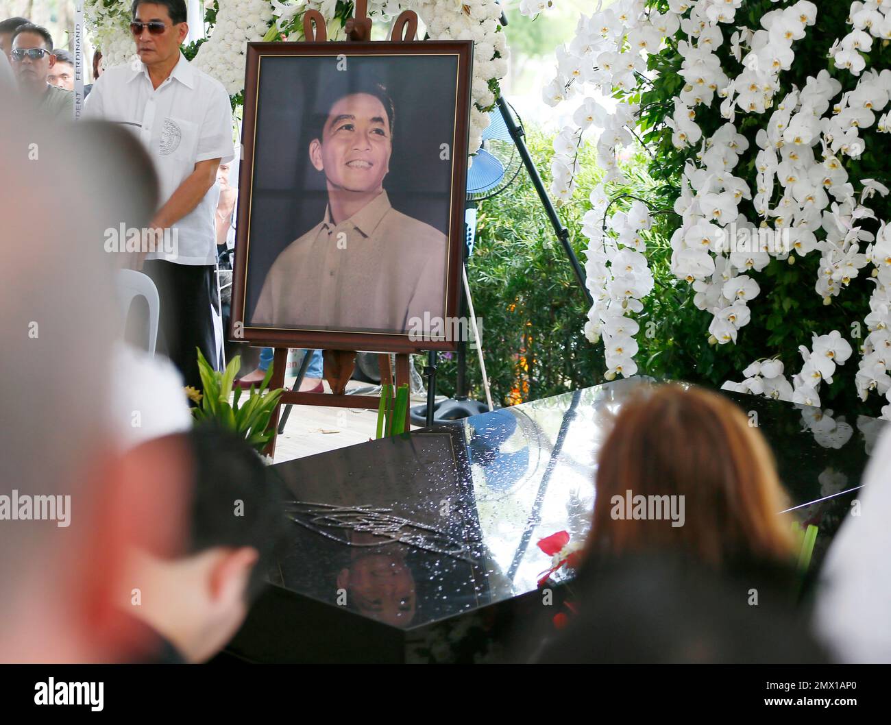 A portrait of the late Philippine dictator Ferdinand Marcos is placed ...