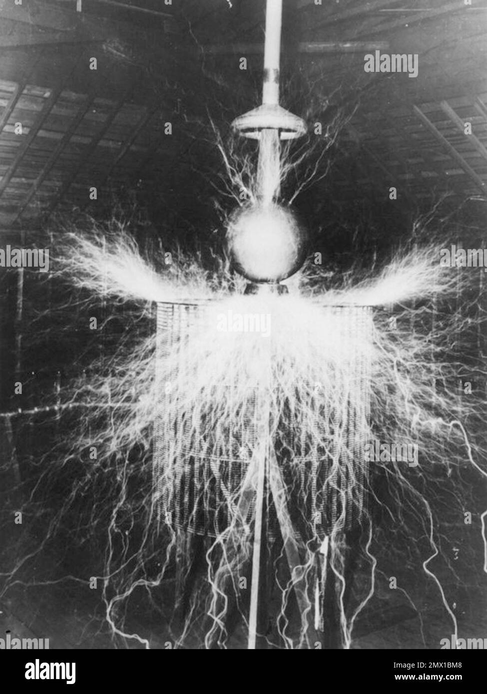 Discharge of same coil with a metal sphere capacitive terminal Stock ...