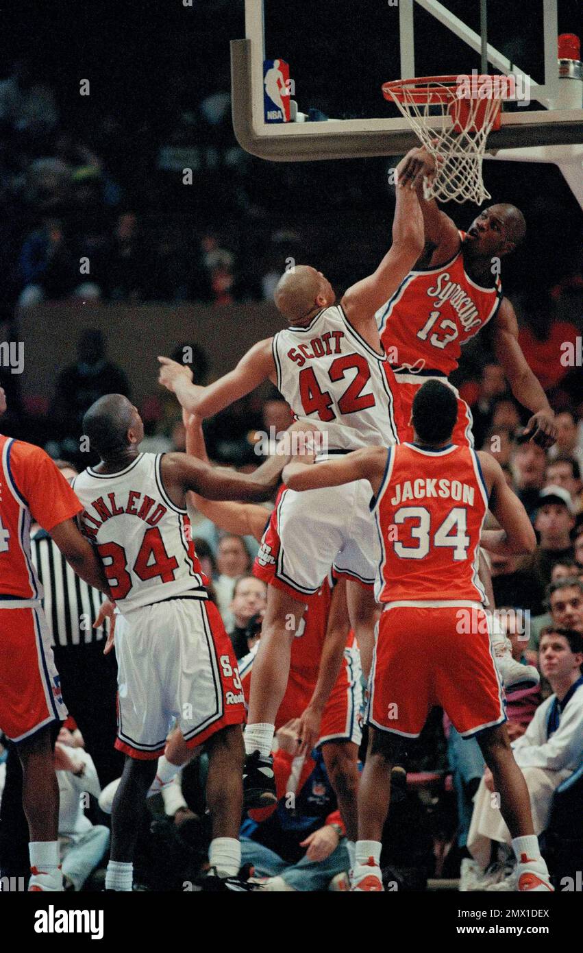 Syracuse's Conrad McRae (13) tries to block a shot by St. John's ...