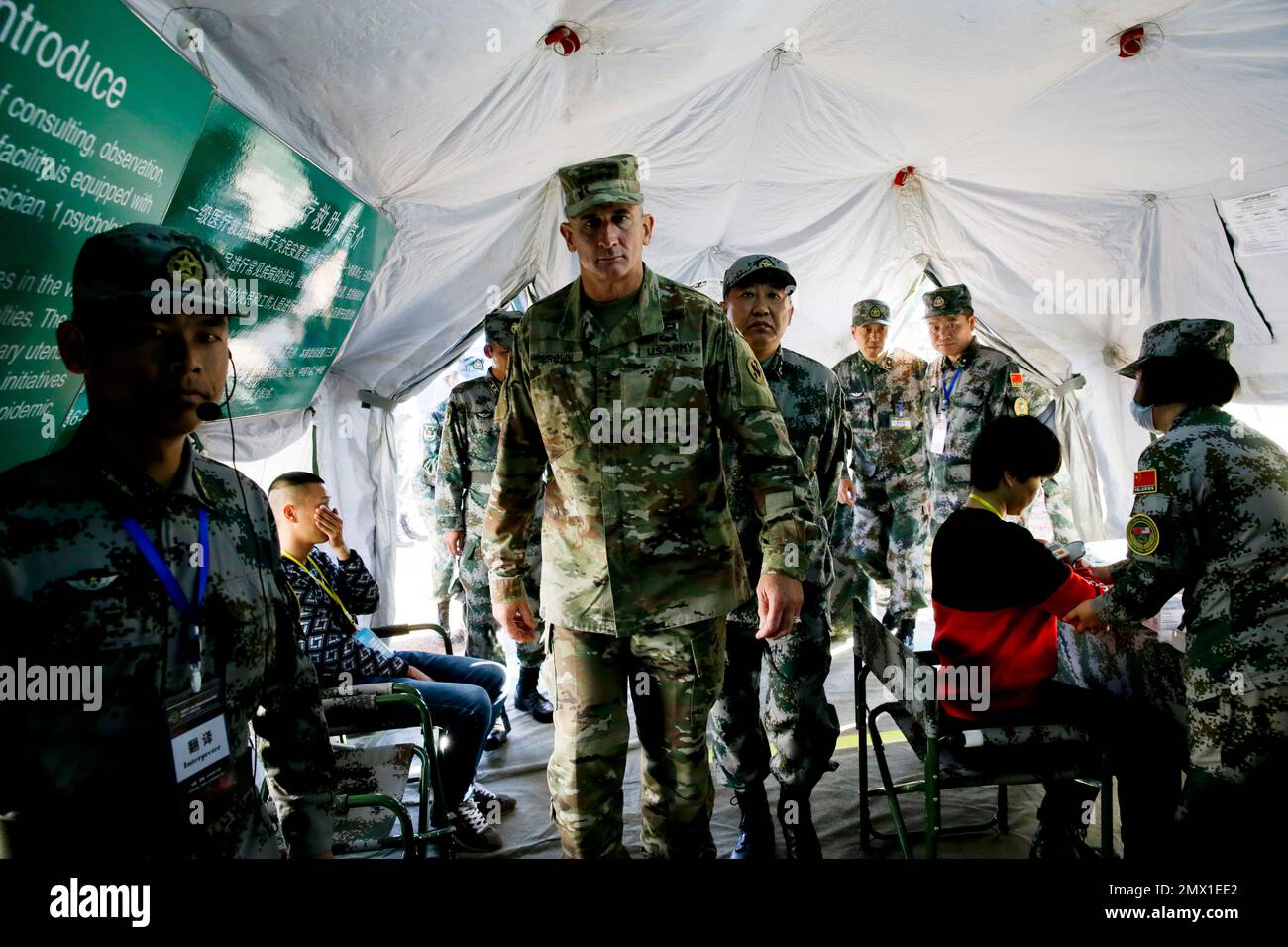 U.S. Army Pacific commander Gen. Robert Brown, center, and Gen. Liu ...