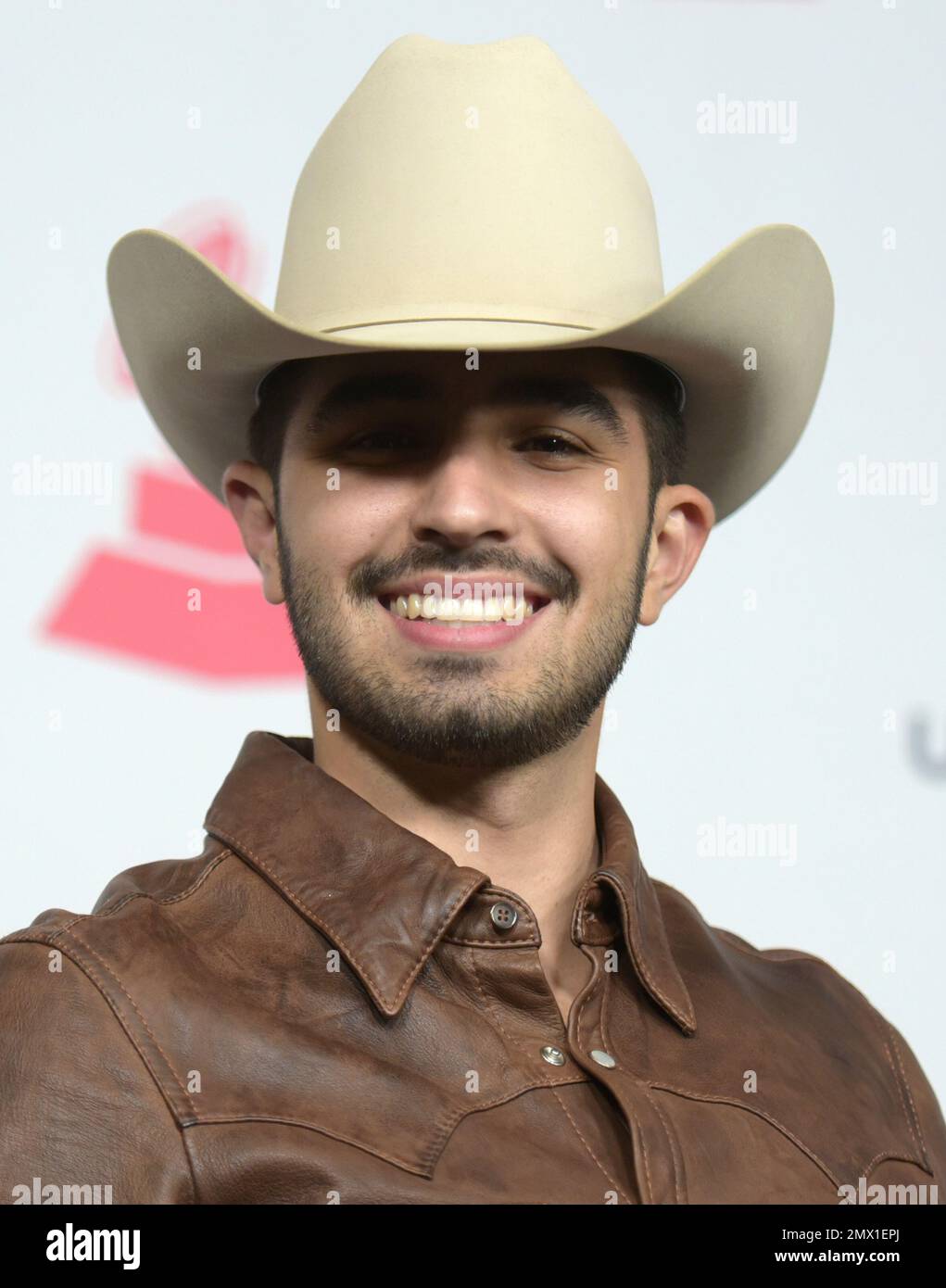 Joss Favela poses in the press room at the 17th annual Latin Grammy ...