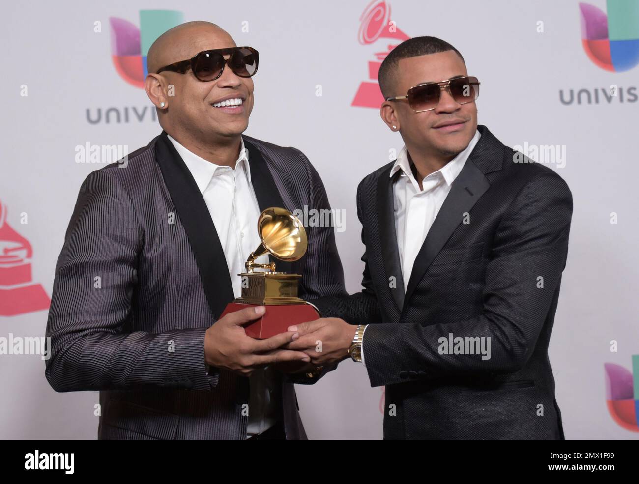 Alexander Delgado, left, and Randy Malcom Martinez, of Gente de Zona ...