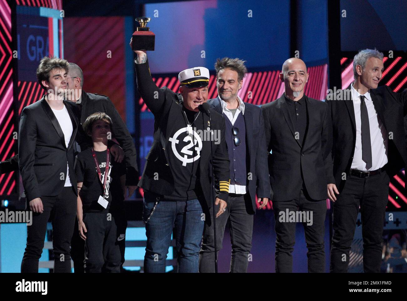 Los Fabulosos Cadillacs accept the award for best rock album for "La ...