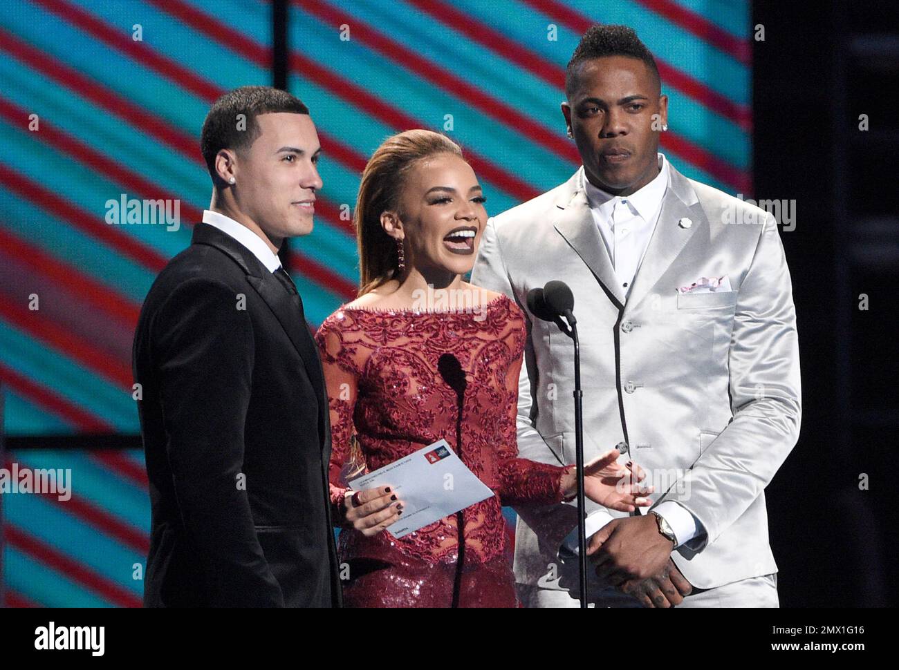Javier Baez, from left, Leslie Grace and Aroldis Chapman present the ...