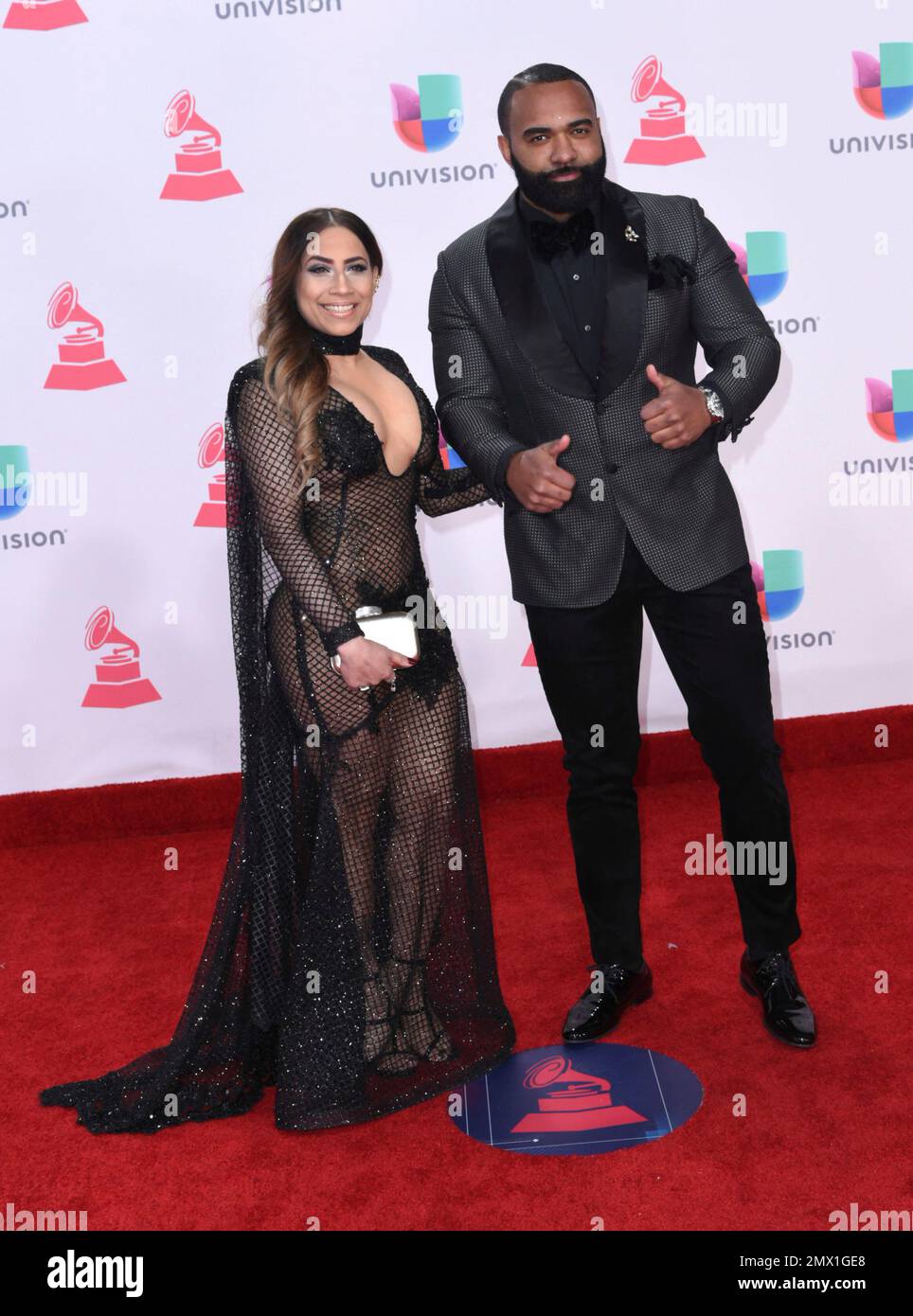 D' Lora Moda, right, arrives at the 17th annual Latin Grammy Awards at ...