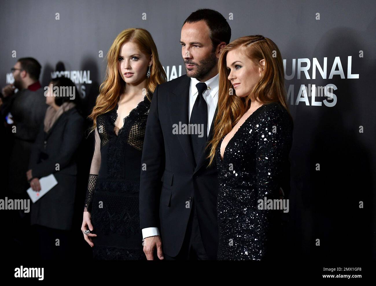 Actress Ellie Bamber, from left, writer-director Tom Ford and actress ...