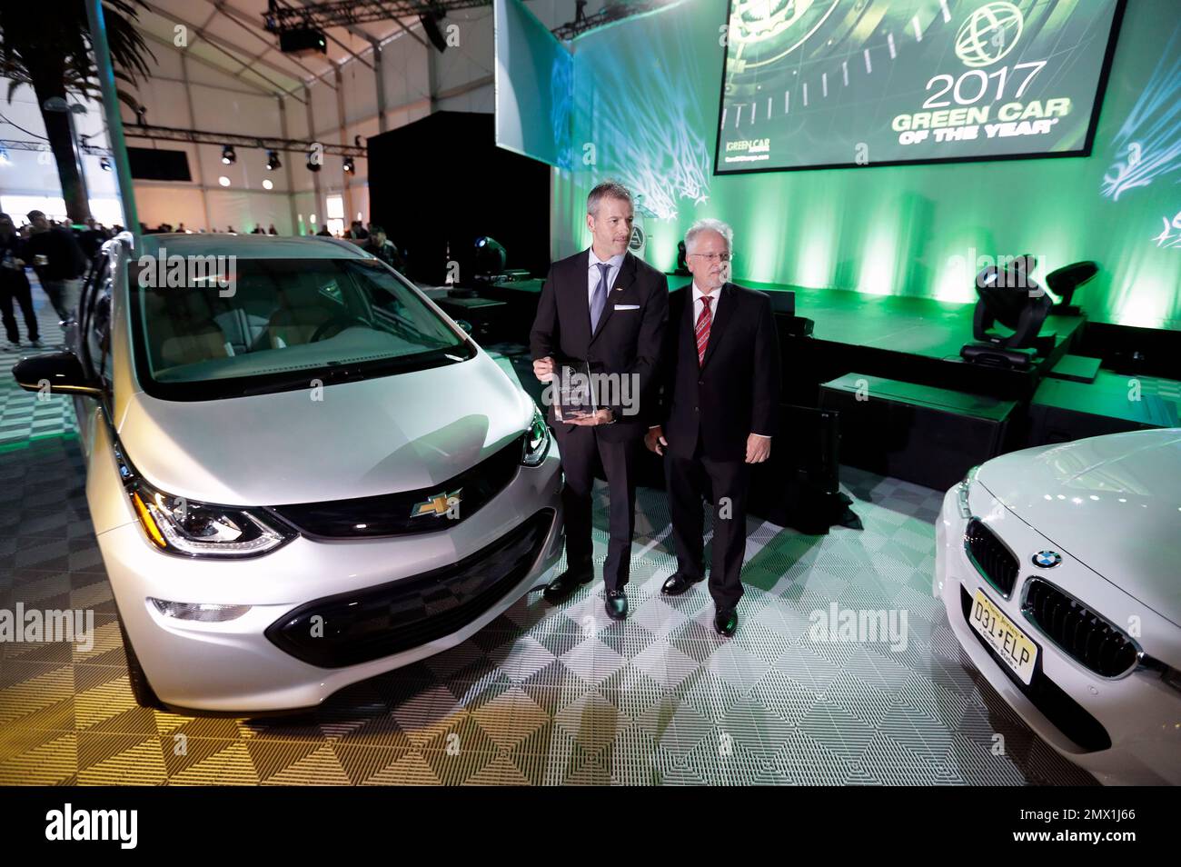 Ron Cogan, editor and publisher of the Green Car Journal, right, and ...