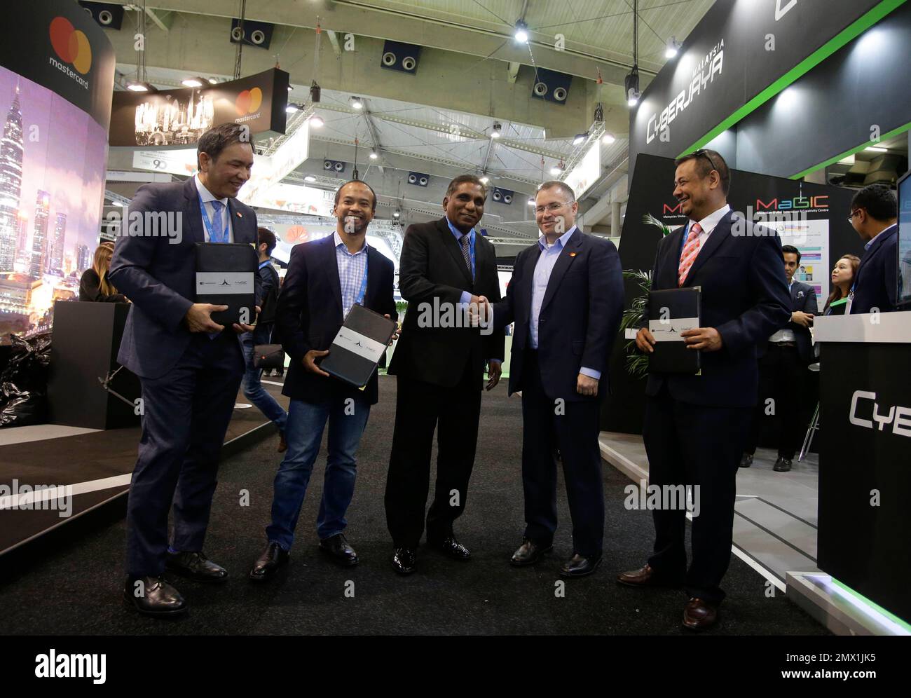 IMAGE DISTRIBUTED FOR MASTERCARD - (From left) Mr. Perry Ong, Country ...