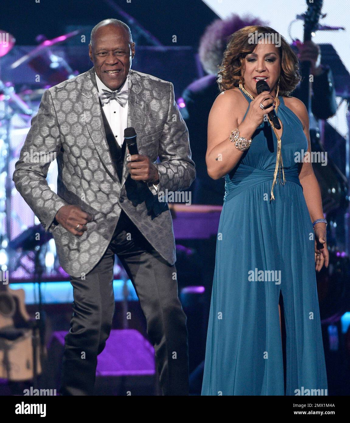 Johnny Ventura, left, and Milly Quezada perform "Tu Amor Me Hace Bien ...