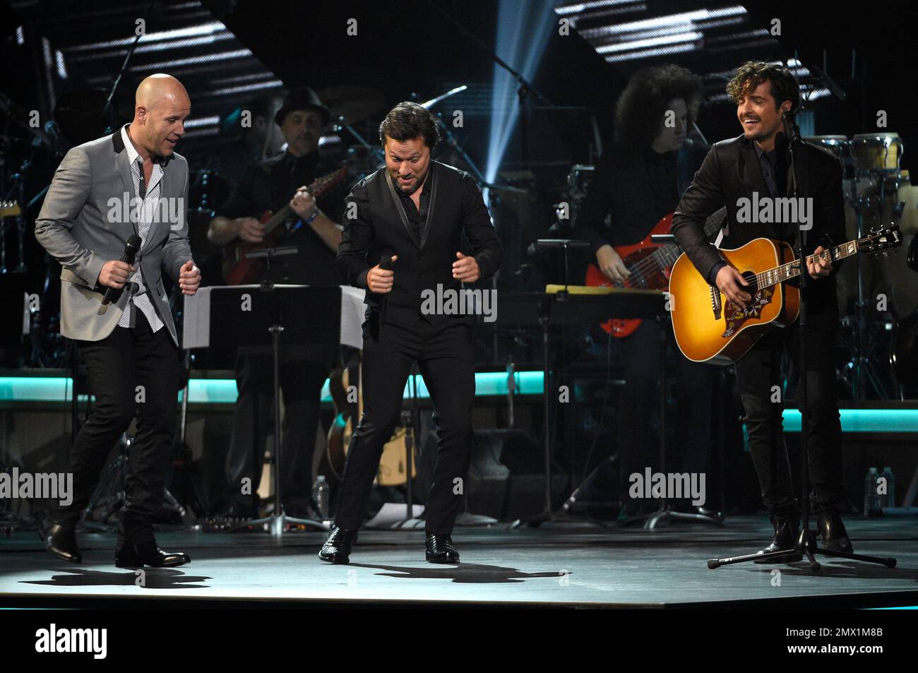 Gian Marco, from left, Diego Torres and Tommy Torres perform "Flor ...