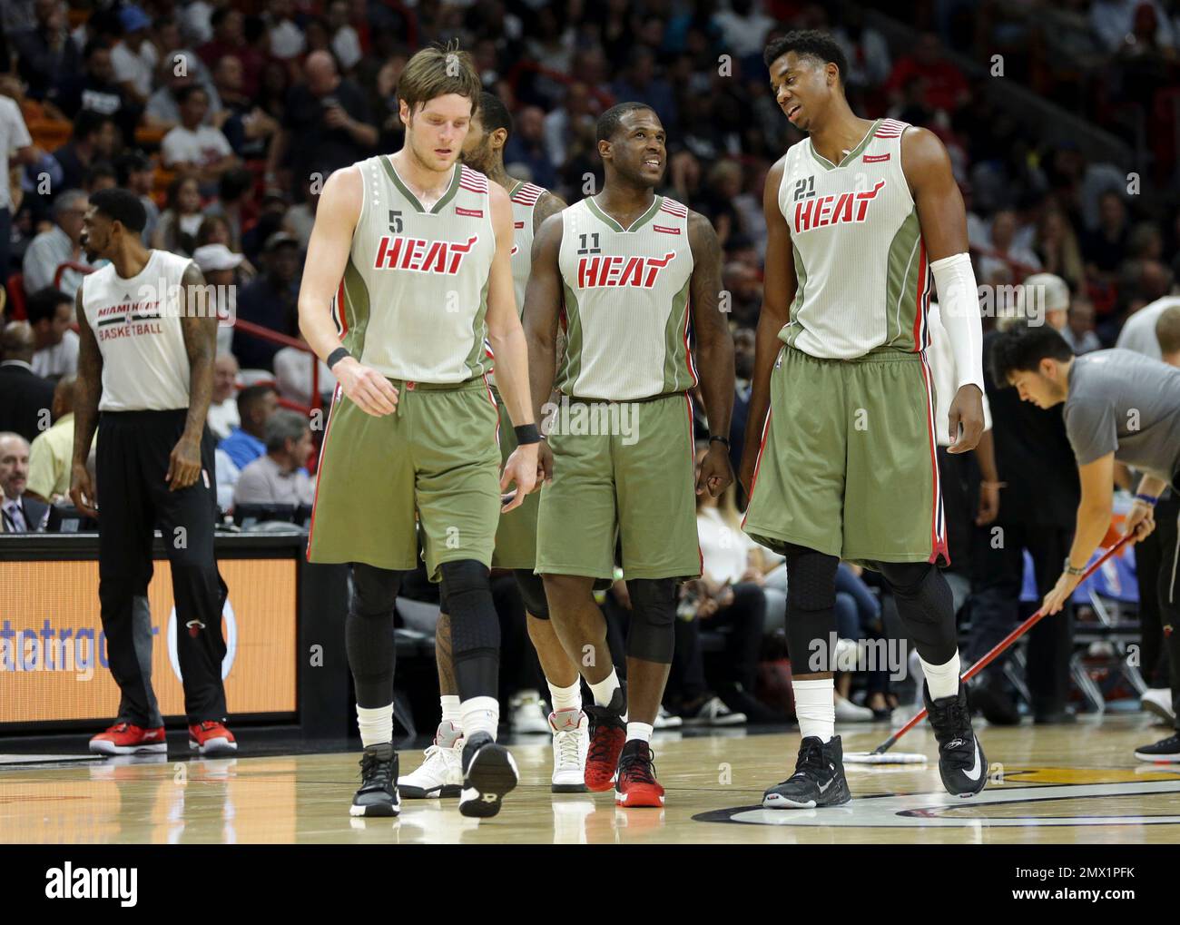 Miami Heat forward Luke Babbitt (5), guard Dion Waiters (11) and center ...
