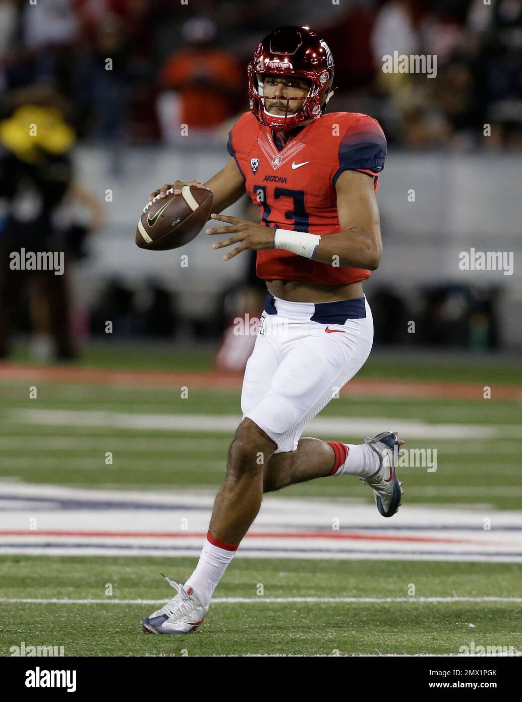 Arizona quarterback Brandon Dawkins (13) during the first half of an ...