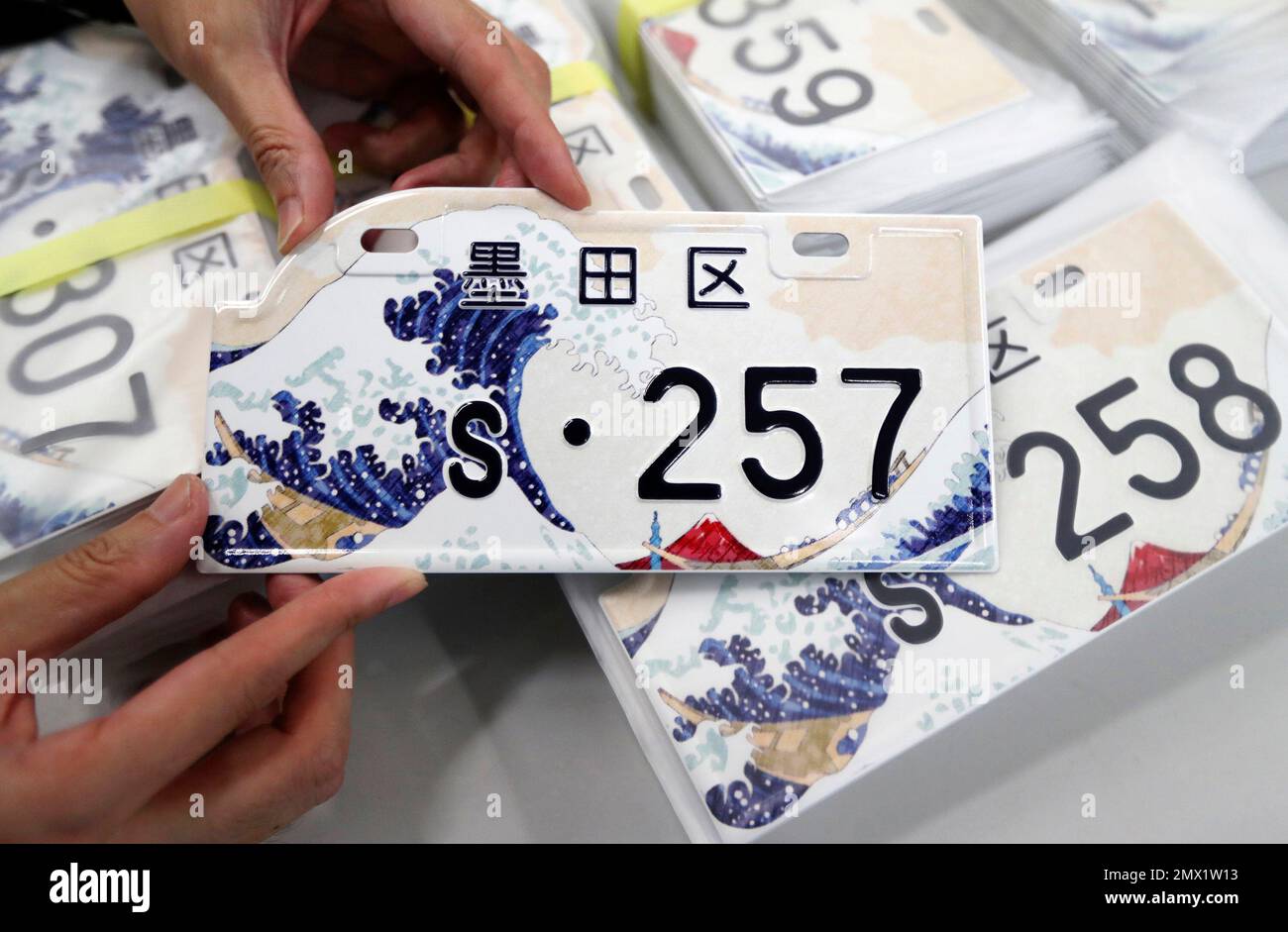 A motorcycle license plate featuring a work of art by world-famous ...