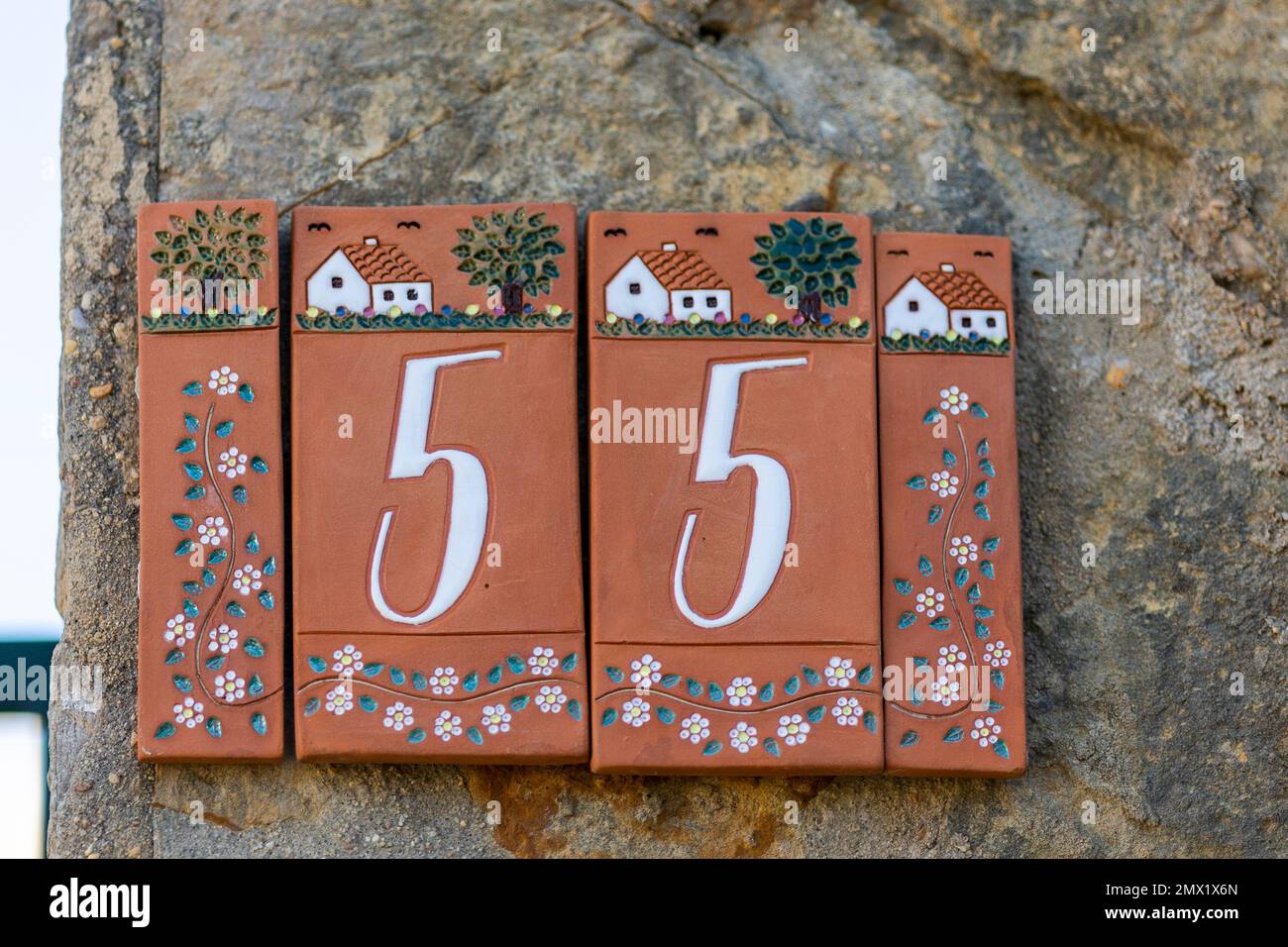 Close up view of a beautiful house number in azulejo tile with ...