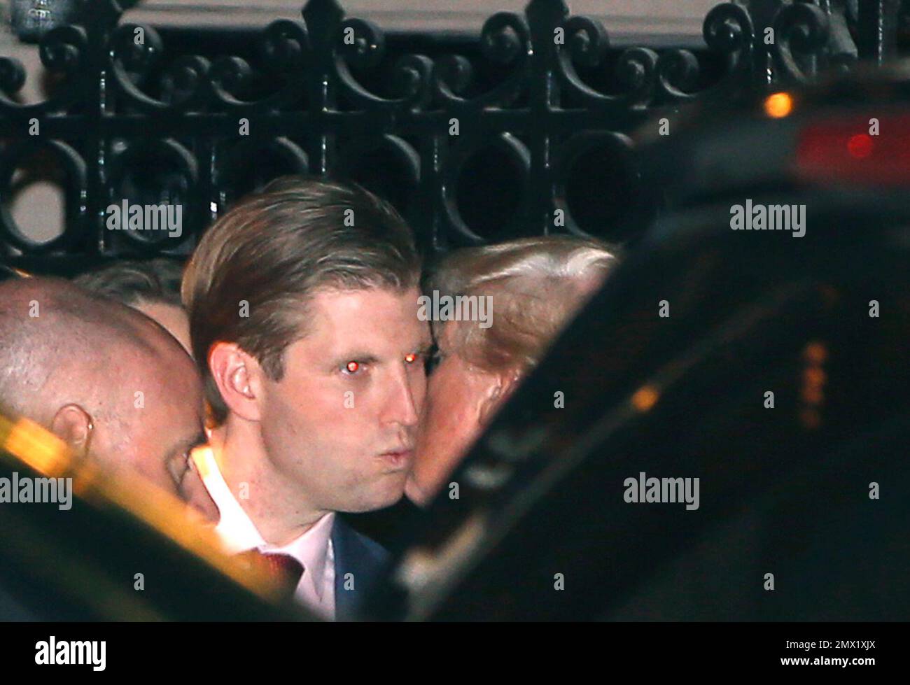 President-elect Donald Trump, right, kisses his son Eric farewell after ...