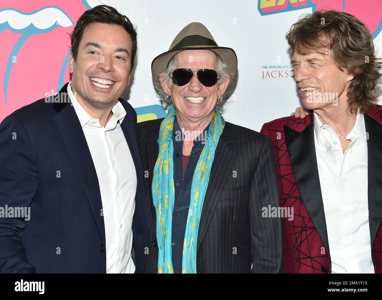 Talk show host Jimmy Fallon, left, shares a laugh with guitarist Keith ...