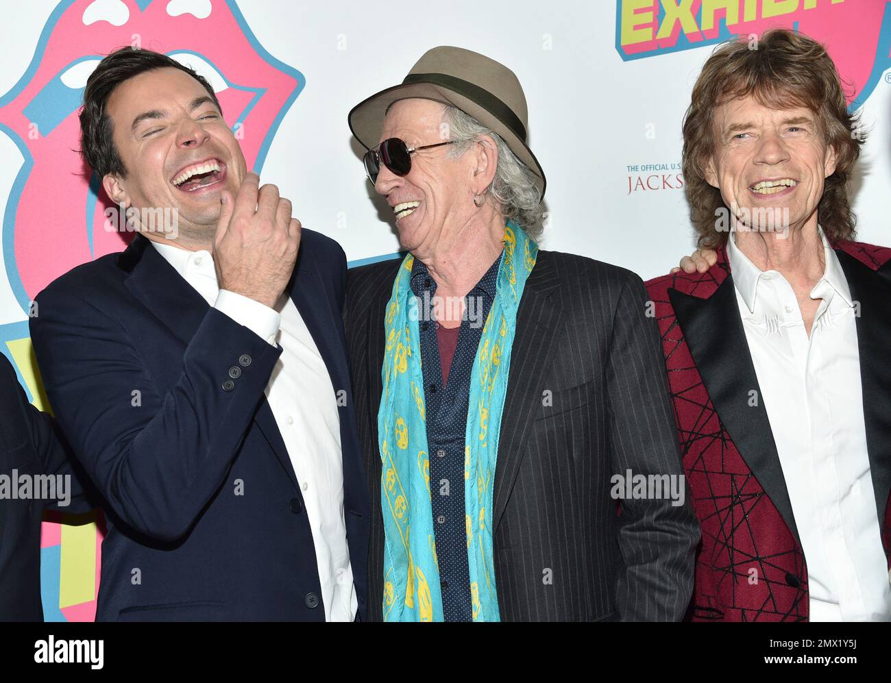 Talk show host Jimmy Fallon, left, shares a laugh with guitarist Keith ...
