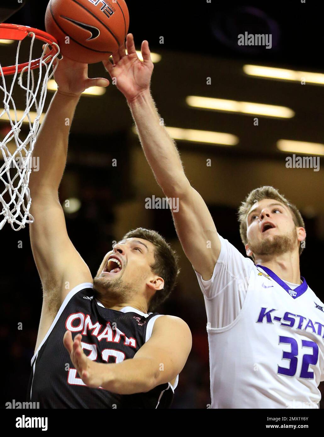 Kansas State forward Dean Wade, right, blocks a shot by Nebraska-Omaha ...