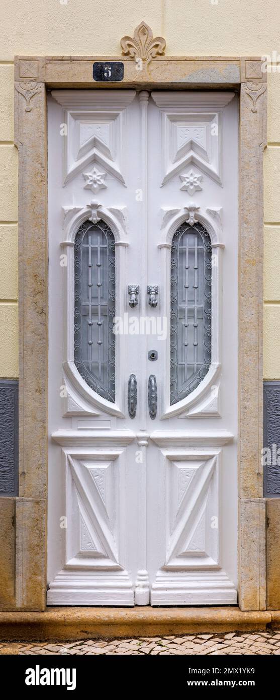 Close view of beautiful details of typical doors and azulejo tiles ...