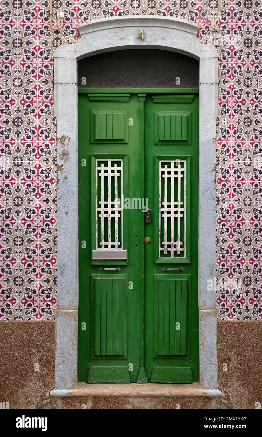 Close view of beautiful details of typical doors and azulejo tiles ...