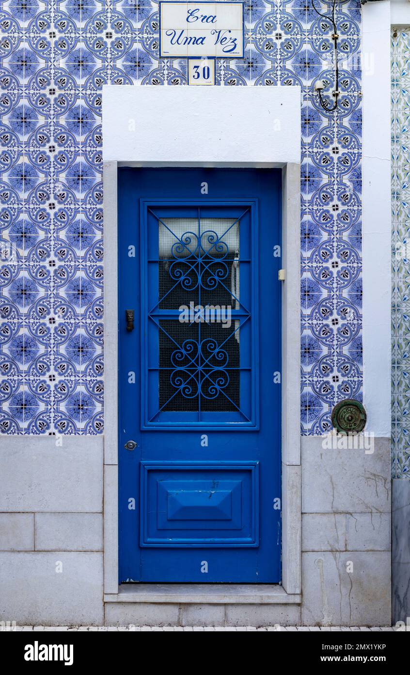 Close view of beautiful details of typical doors and azulejo tiles ...