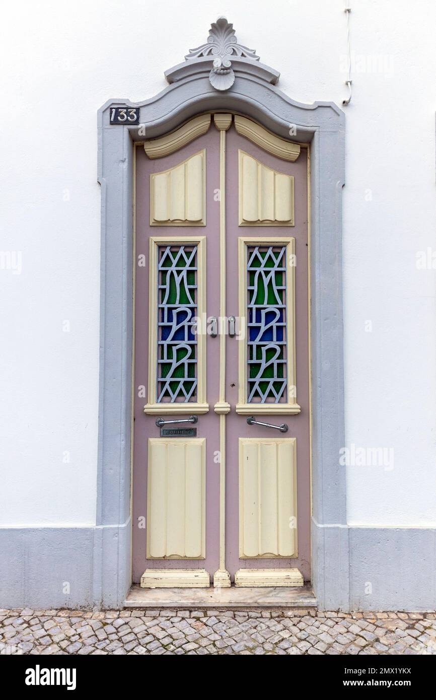 Close view of beautiful details of typical doors and azulejo tiles ...
