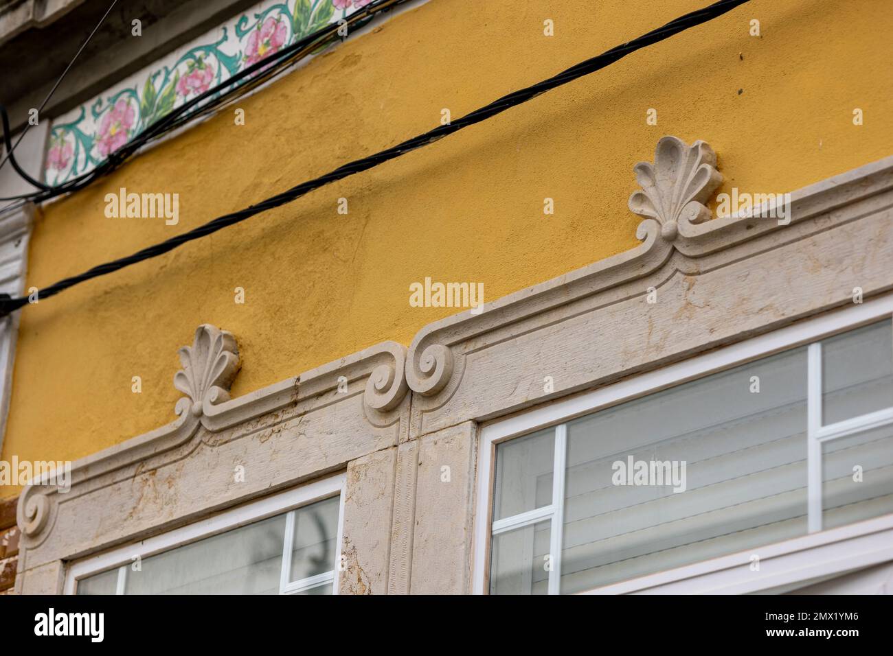 Close view of beautiful details of typical windows and azulejo tiles ...